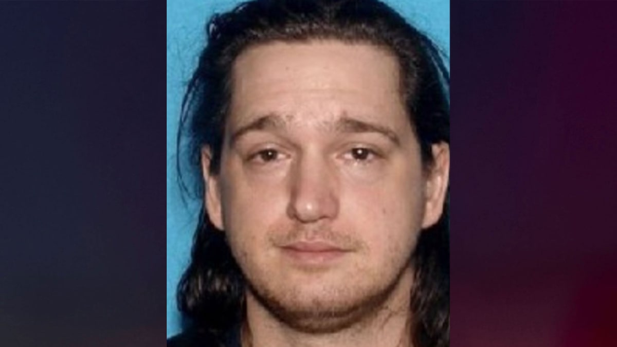 Man arrested after missing woman found dead in attic